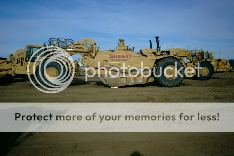 Any experience with a 657 Auger scraper | Heavy Equipment Forums